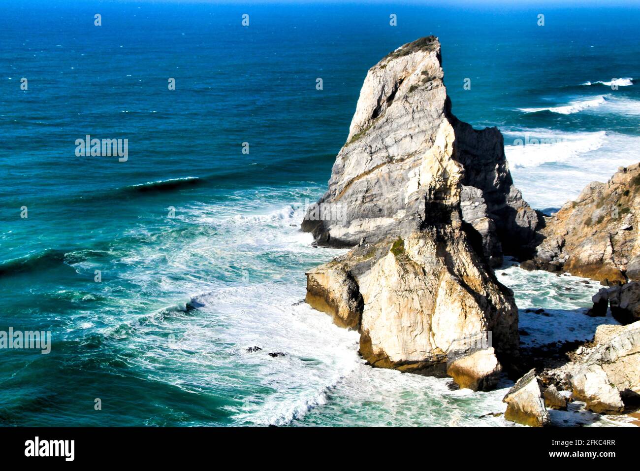 Beautiful Ursa beach with its colossal rock formations and the blue ...