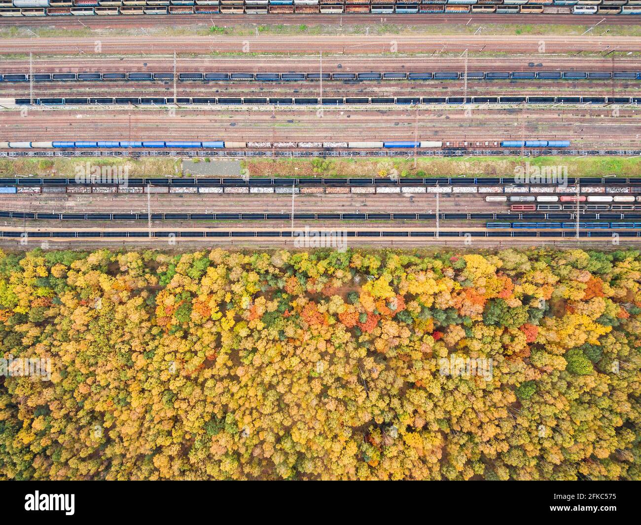 Autumn forest and railway depot top down aerial view Stock Photo - Alamy