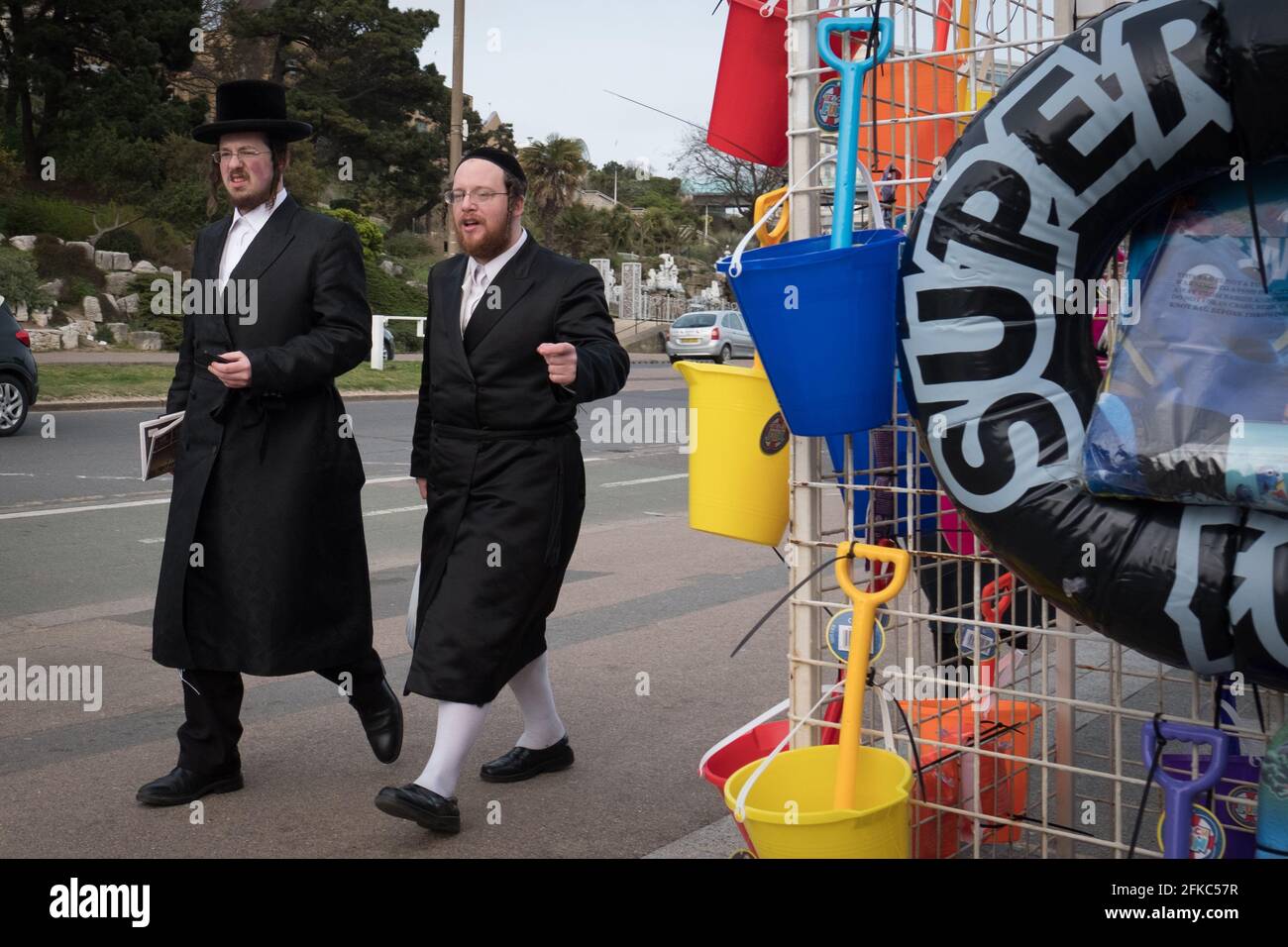 Orthodox Jews spend a day on the sea front at Southend-on-Sea, Essex ...
