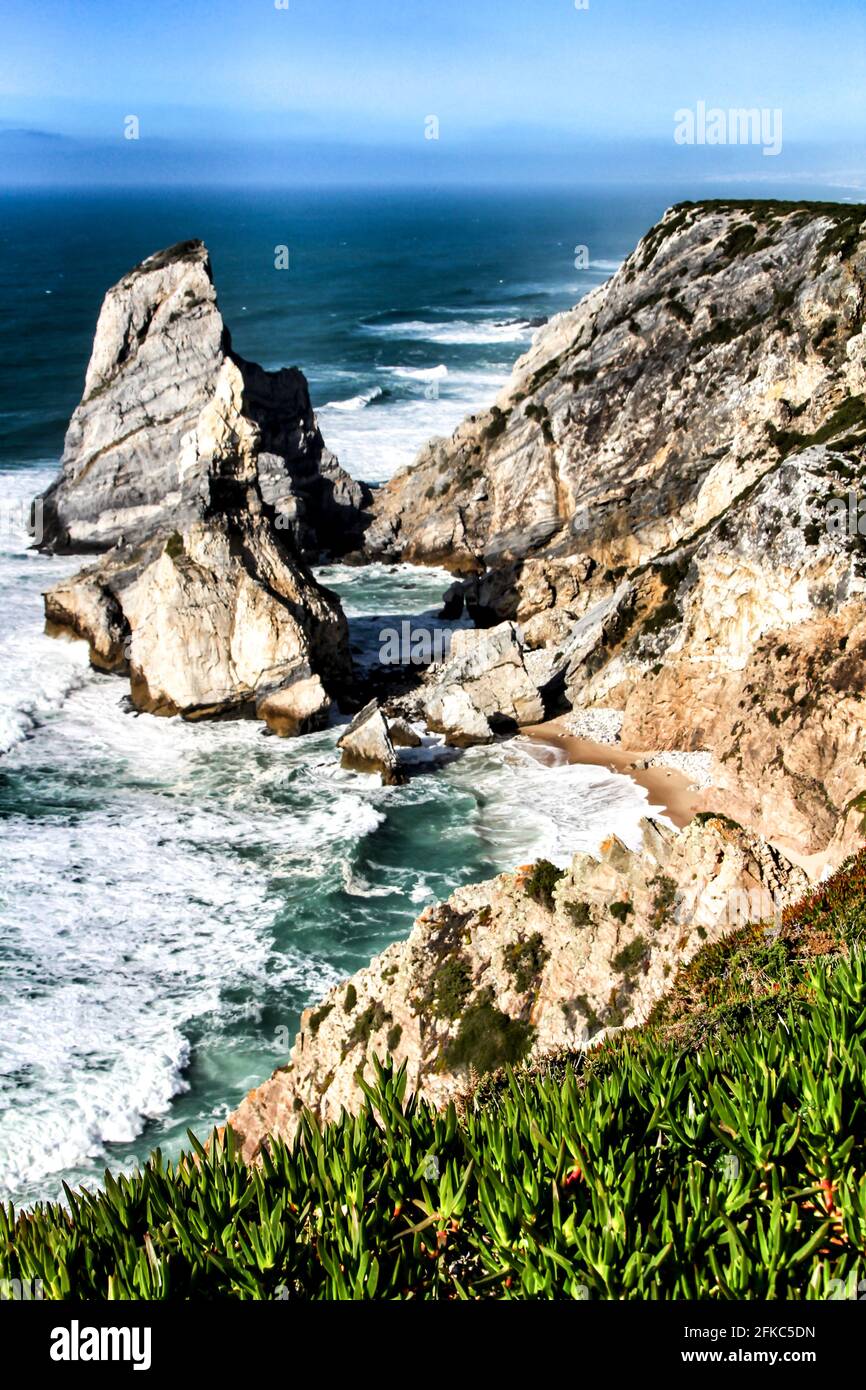 Beautiful Ursa beach with its colossal rock formations and the blue ...