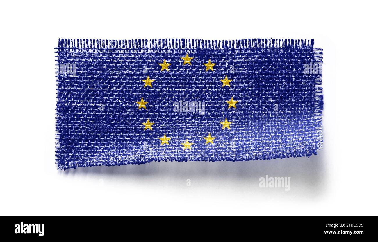 European Union flag on a piece of cloth on a white background Stock ...