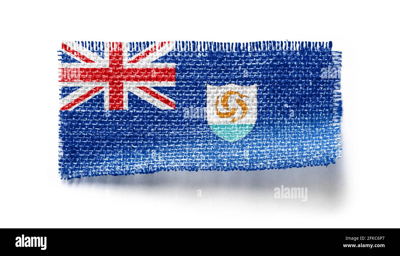 Anguilla flag on a piece of cloth on a white background Stock Photo - Alamy