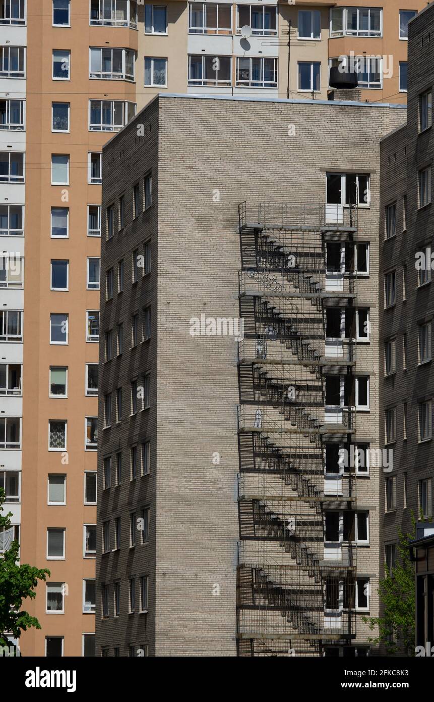 Typical old dormitory with balconies on the background with modern ...