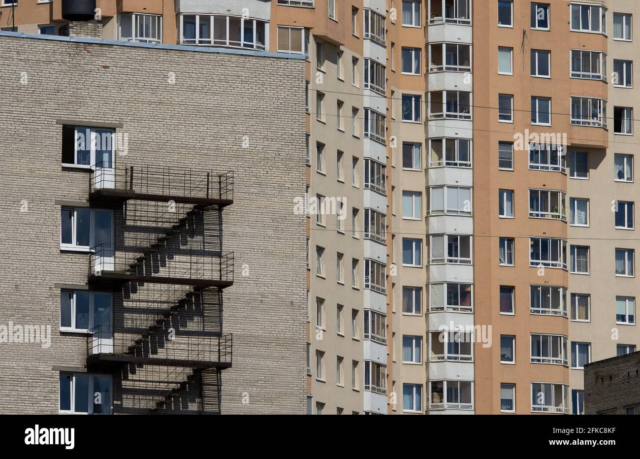 Old dormitory and modern house with a many windows (Saint Petersburg ...
