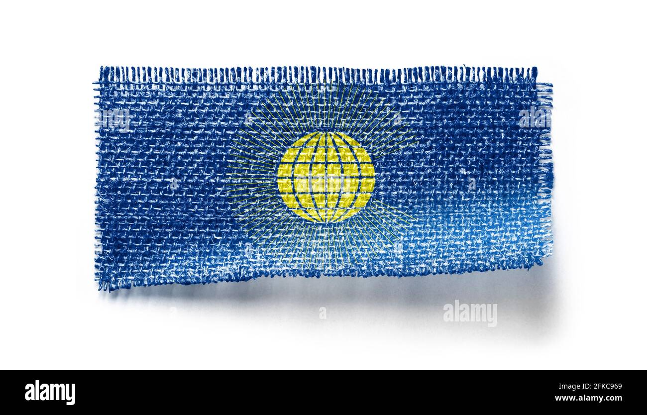 Commonwealth flag on a piece of cloth on a white background Stock Photo ...