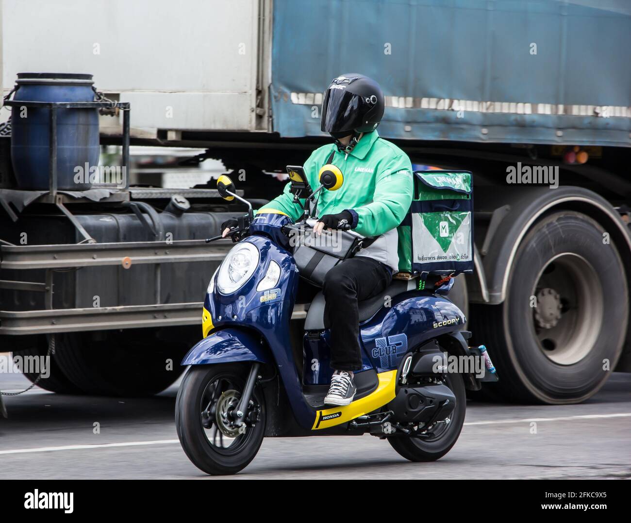 Chiangmai, Thailand - March 16 2021: Delivery service man ride a ...