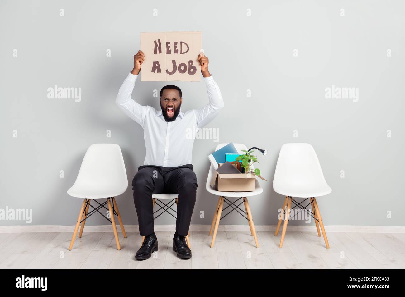 Full length body size photo of angry man sitting waiting for interviews ...