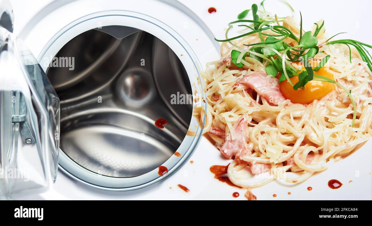 Wash food and sauce stains. Opened washing machine and pasta with sauce ...