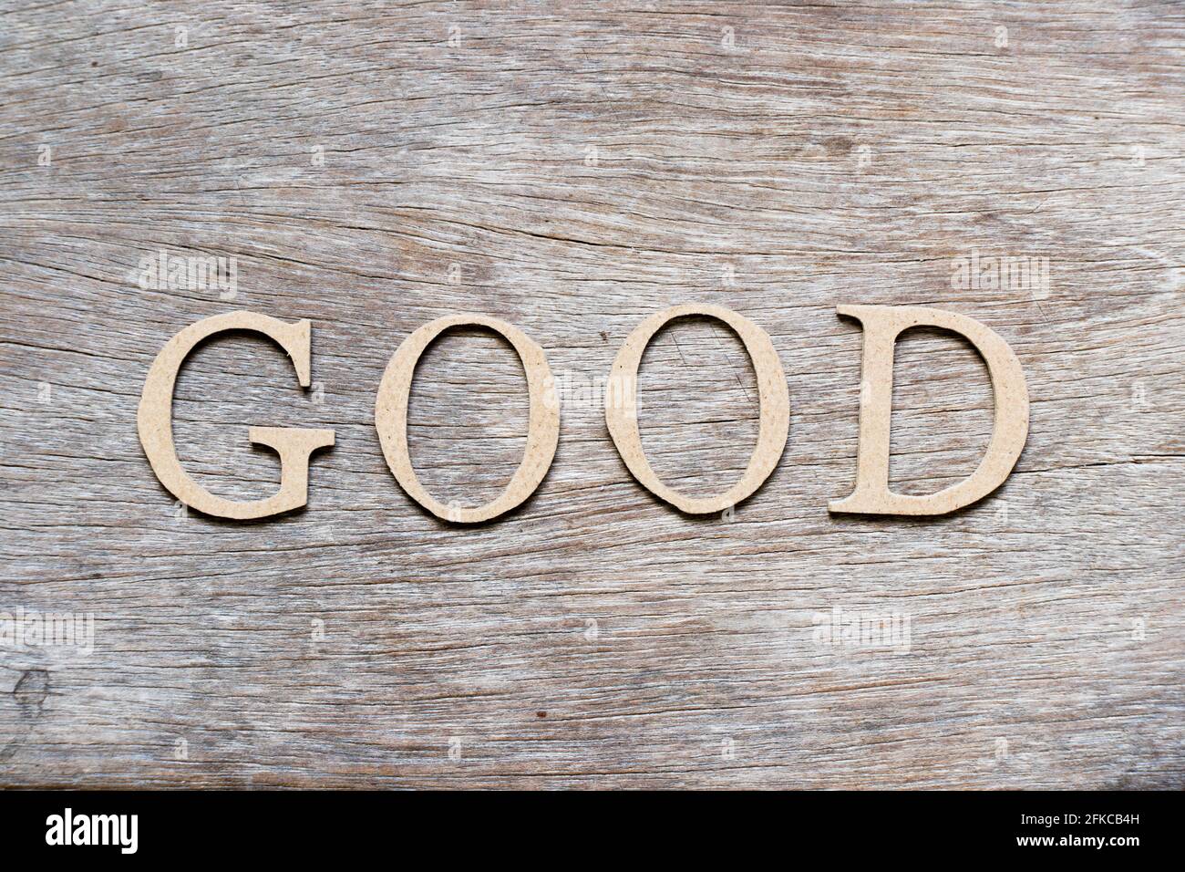 Alphabet letter in word good on wood background Stock Photo - Alamy