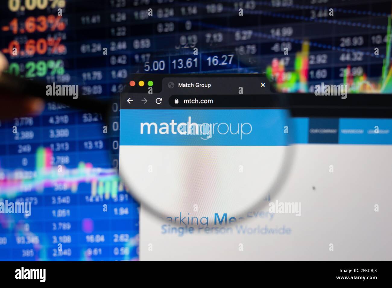 Matchgroup company logo on a website with blurry stock market ...