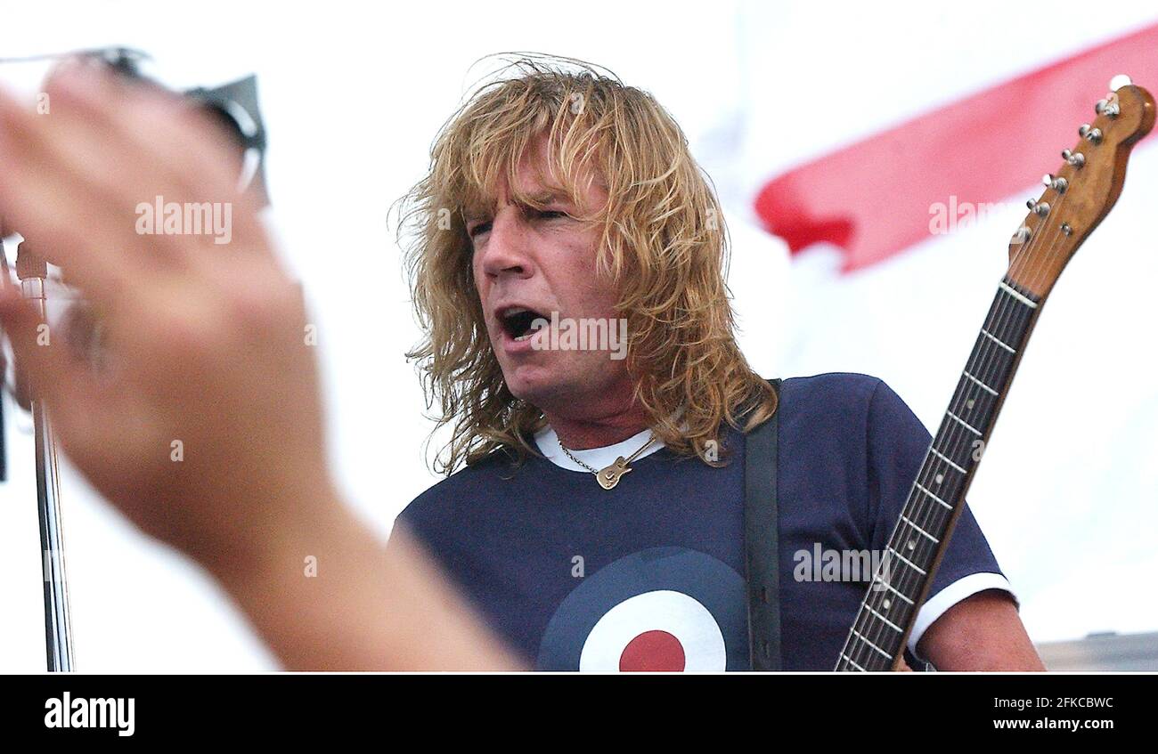 STATUS QUO'S RICK PARFITT ON STAGE ABOARD HMS ARK ROYAL AT PORTSMOUTH ...
