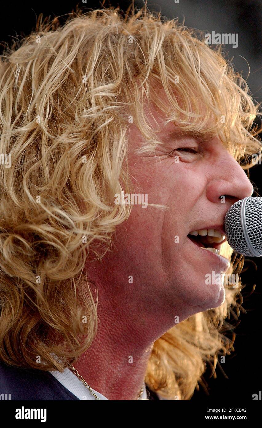 STATUS QUO'S RICK PARFITT ON STAGE ABOARD HMS ARK ROYAL AT PORTSMOUTH ...
