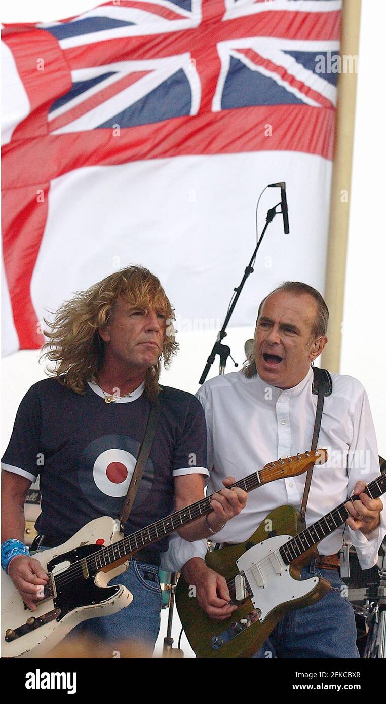 STATUS QUO'S RICK PARFITT AND FRANCIS ROSSI ON STAGE ABOARD HMS ARK ...