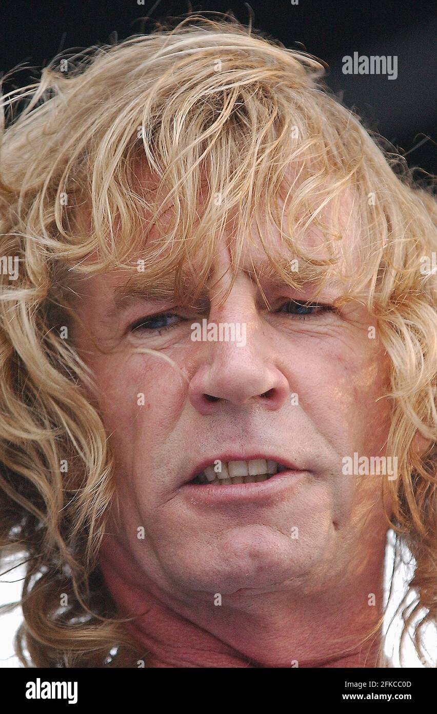 STATUS QUO'S RICK PARFITT ON STAGE ABOARD HMS ARK ROYAL AT PORTSMOUTH ...