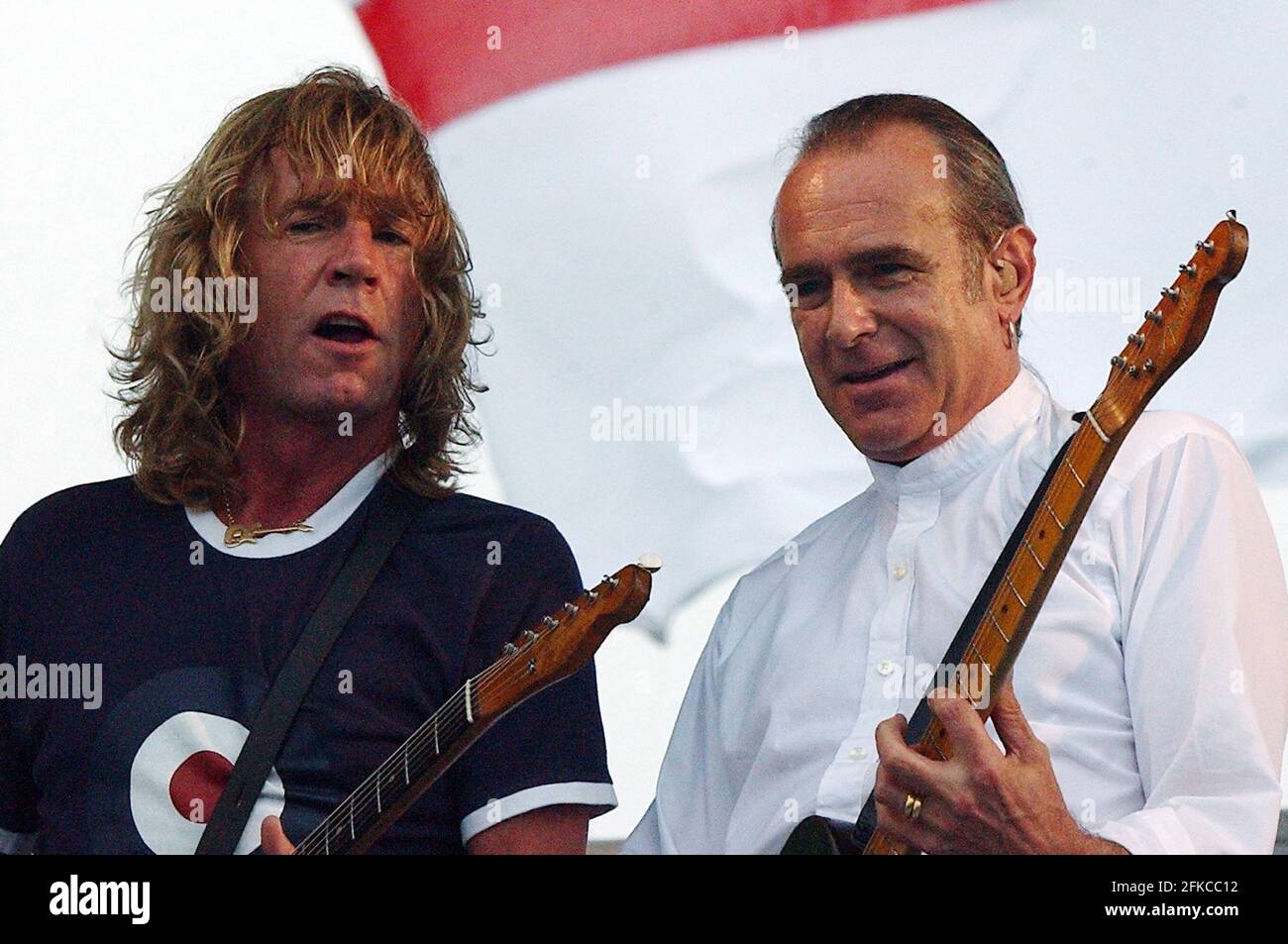 STATUS QUO'S RICK PARFITT AND FRANCIS ROSSI ON STAGE ABOARD HMS ARK ...