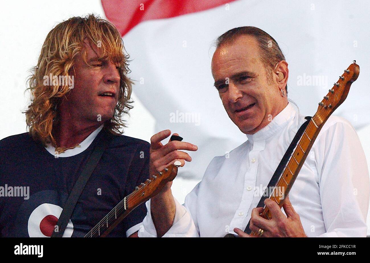 STATUS QUO'S RICK PARFITT AND FRANCIS ROSSI ON STAGE ABOARD HMS ARK ...
