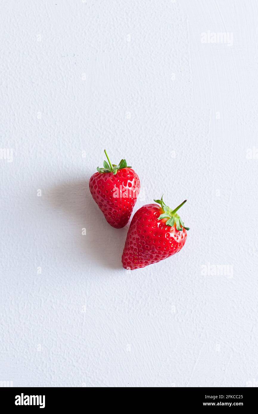 Two strawberries hi-res stock photography and images - Alamy