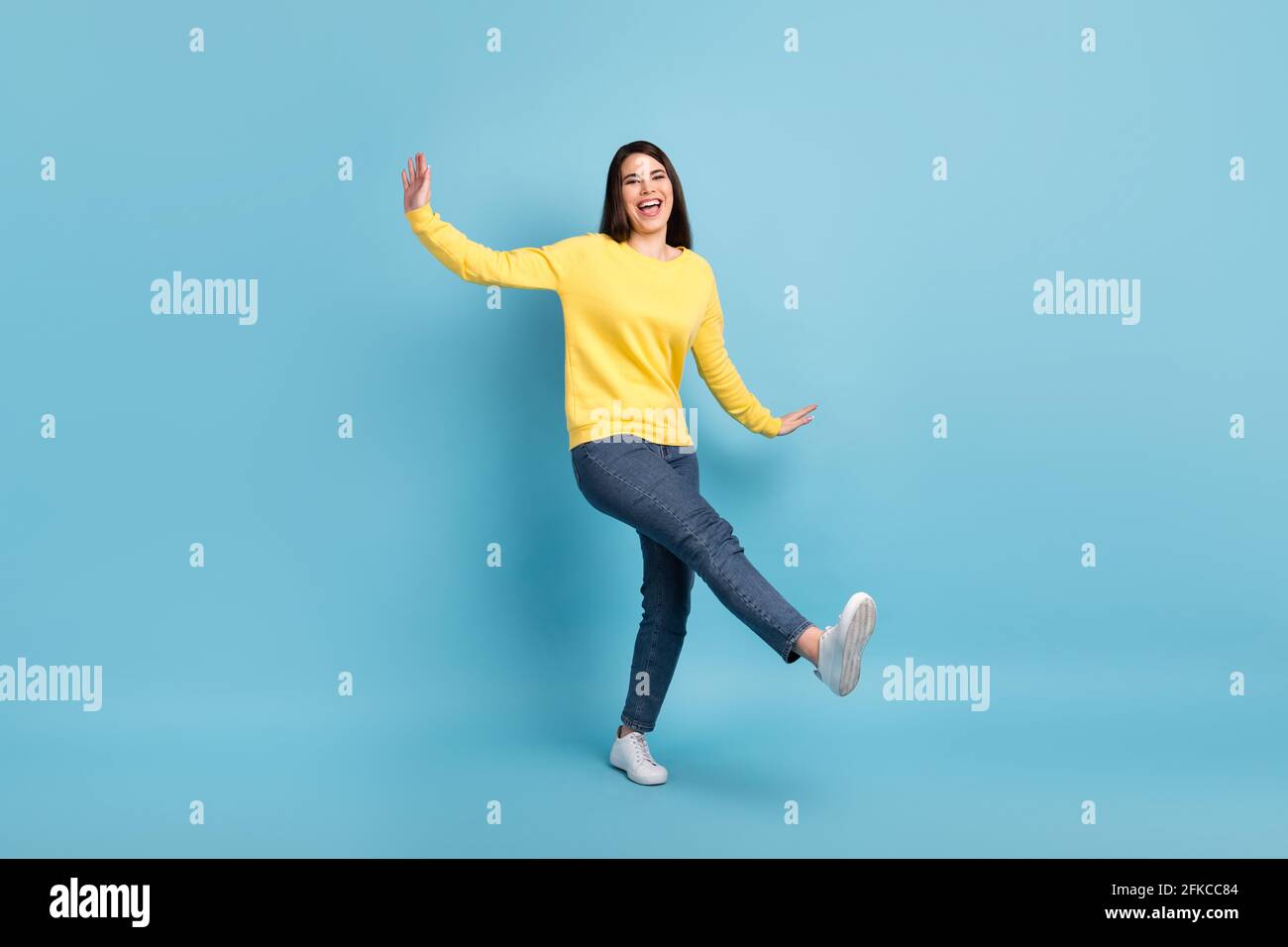 Photo of funky lovely lady dance raise hands open mouth wear yellow ...
