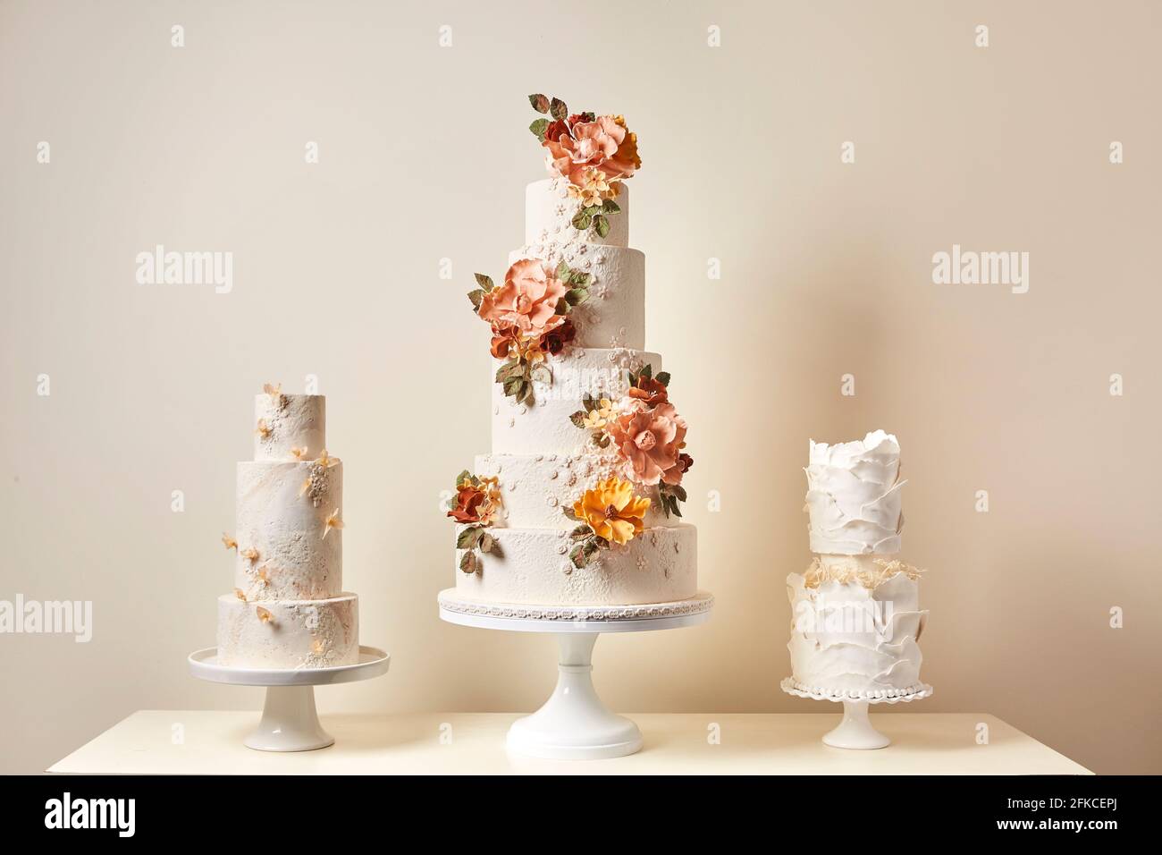 Three decorative wedding cakes on display Stock Photo - Alamy