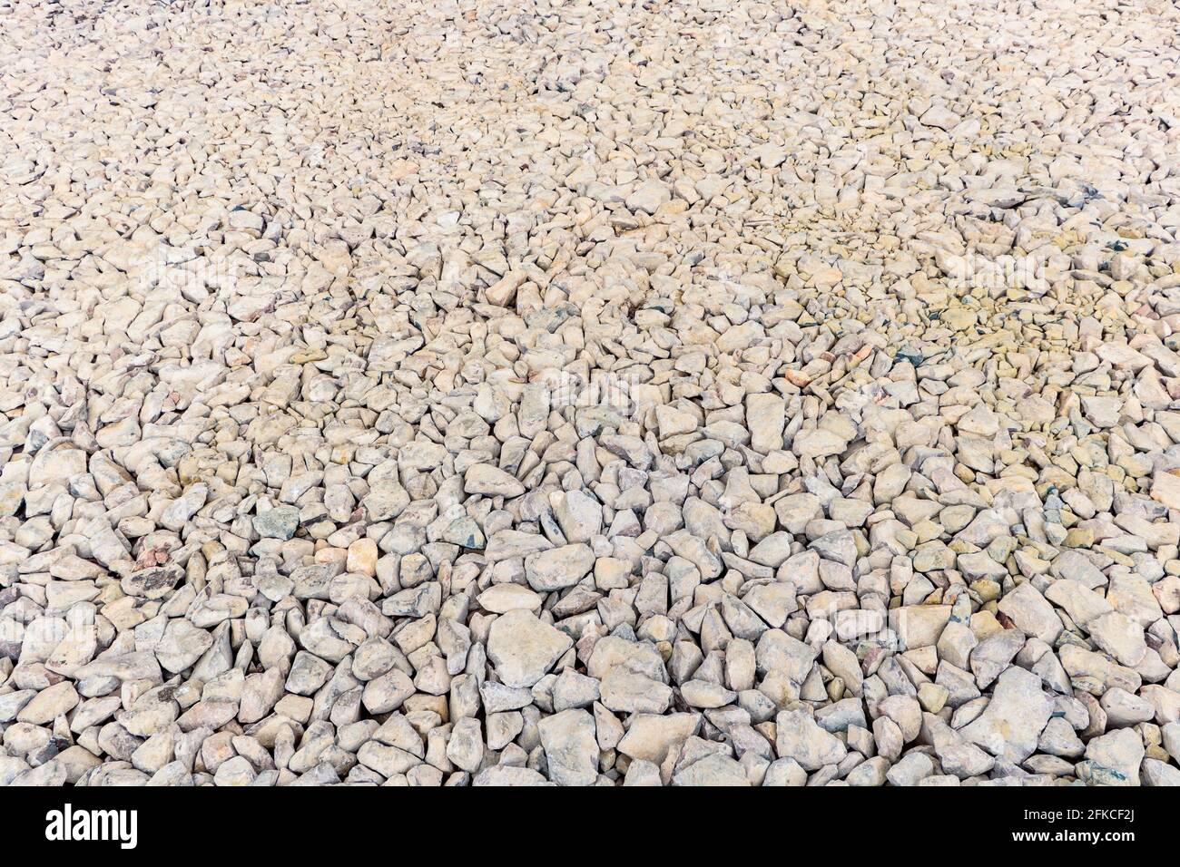 Various irregularly shaped, compacted stones as the basis for future ...