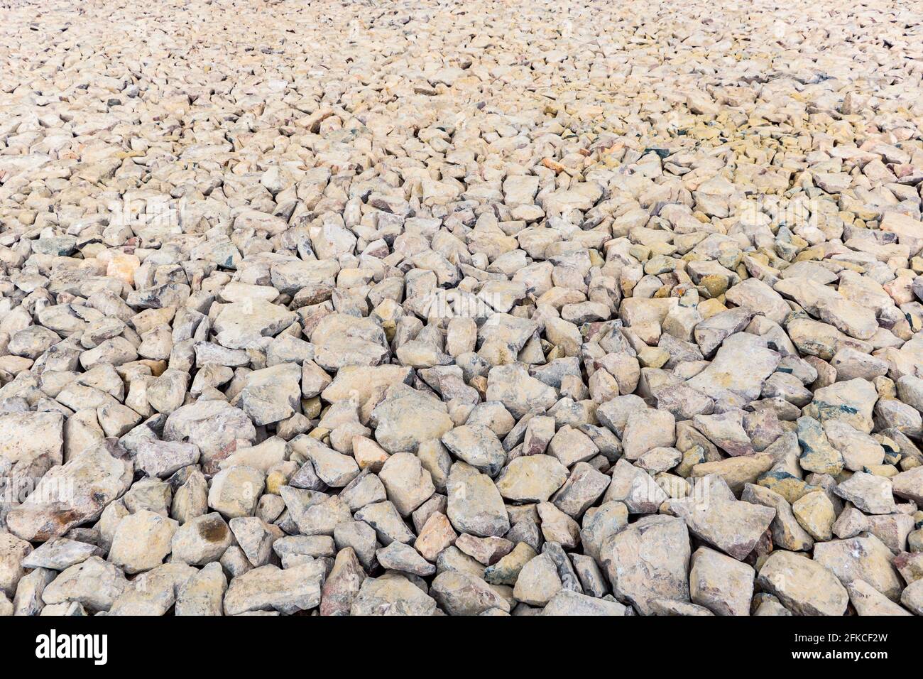 Various irregularly shaped, compacted stones as the basis for future ...