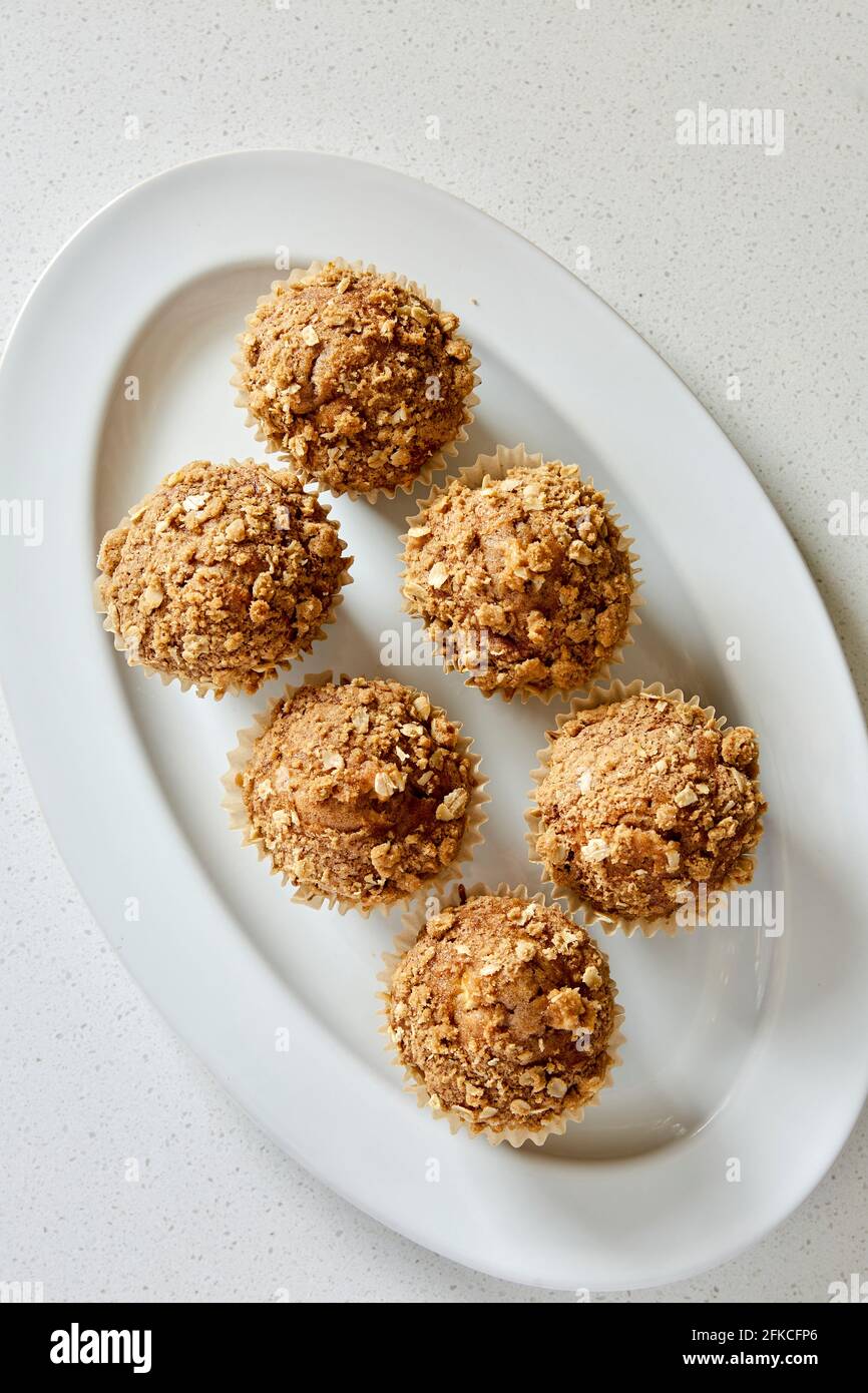 Top view of an assortment of muffins on a white serving dish Stock ...