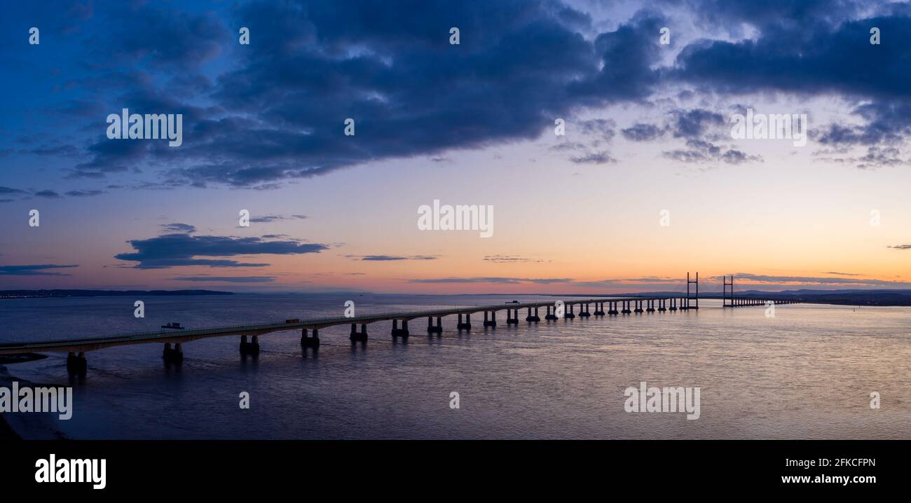 Severn Bridge crossing from England to Wales, at sunset. The bridge is ...