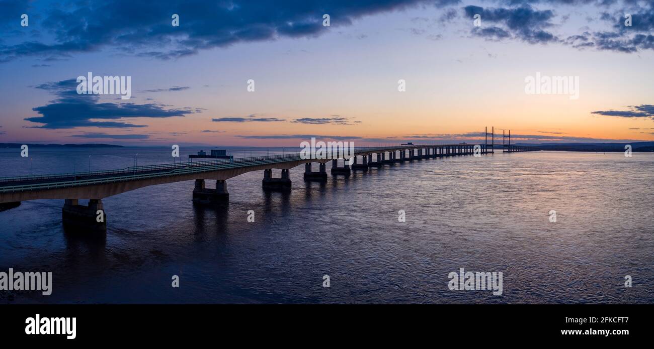 Severn Bridge crossing from England to Wales, at sunset. The bridge is ...