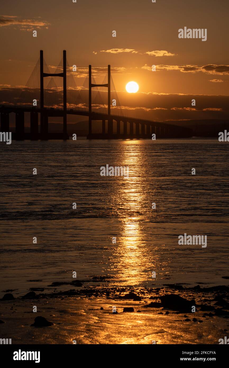 Severn Bridge crossing from England to Wales, at sunset. The bridge is ...