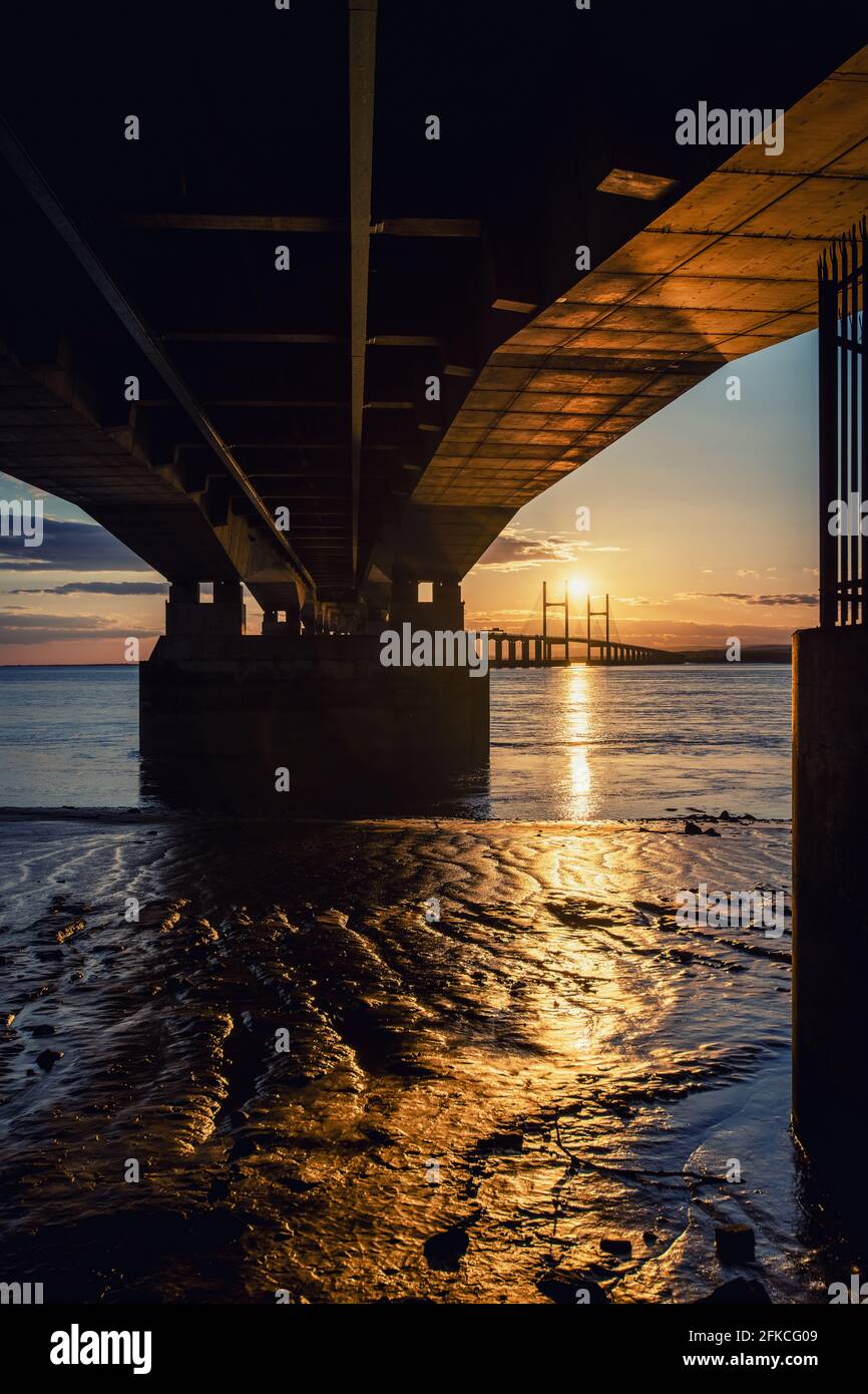 Severn Bridge crossing from England to Wales, at sunset. The bridge is ...