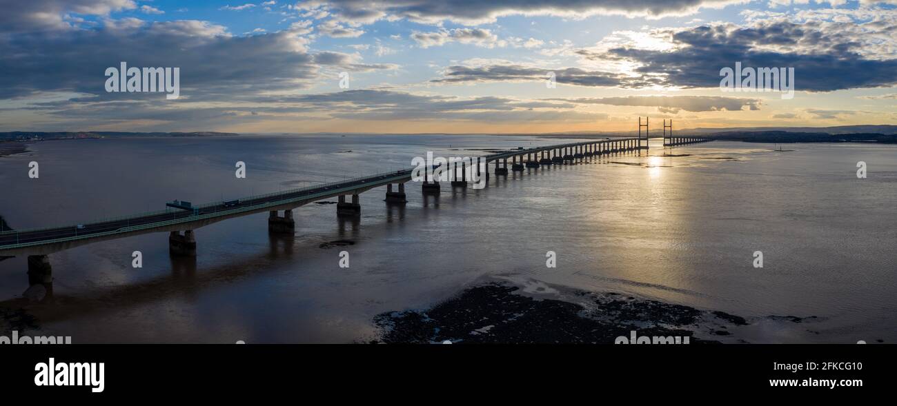 Severn Bridge crossing from England to Wales, at sunset. The bridge is ...