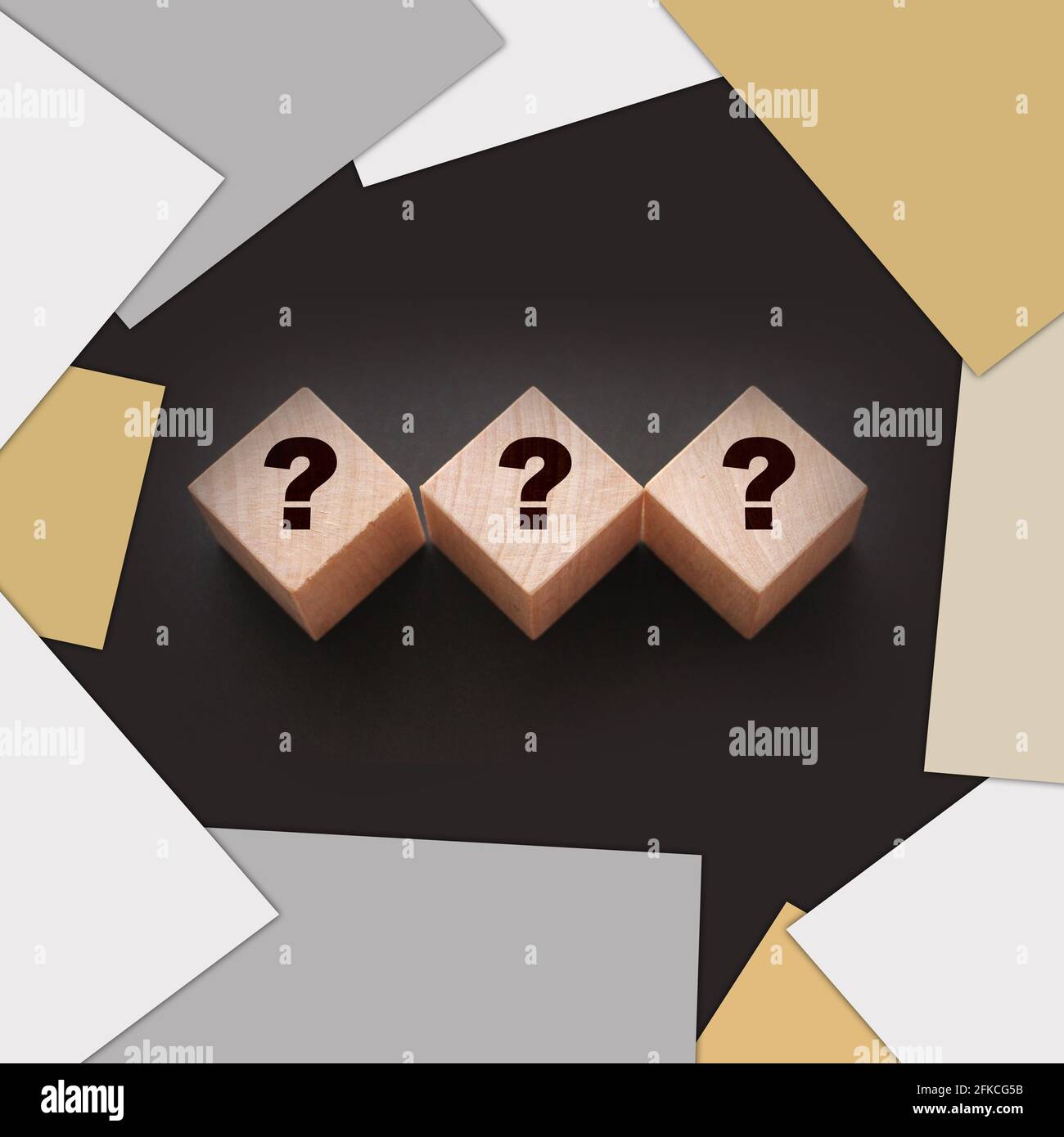 Three wooden blocks with black question marks. Faq questions and ...