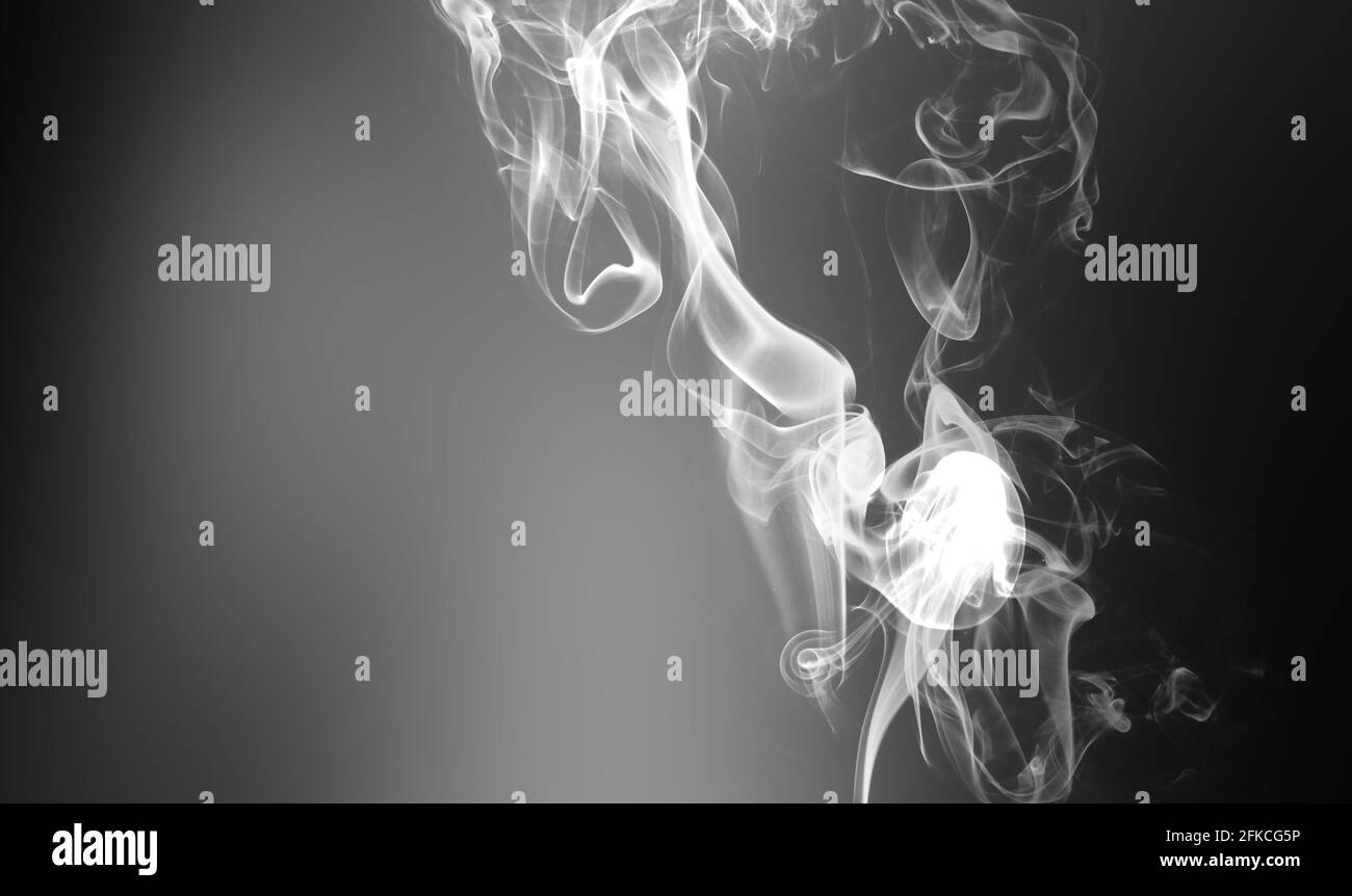 Cigarette smoke over blacl wall. Healthcare nonsmoking addictions ...