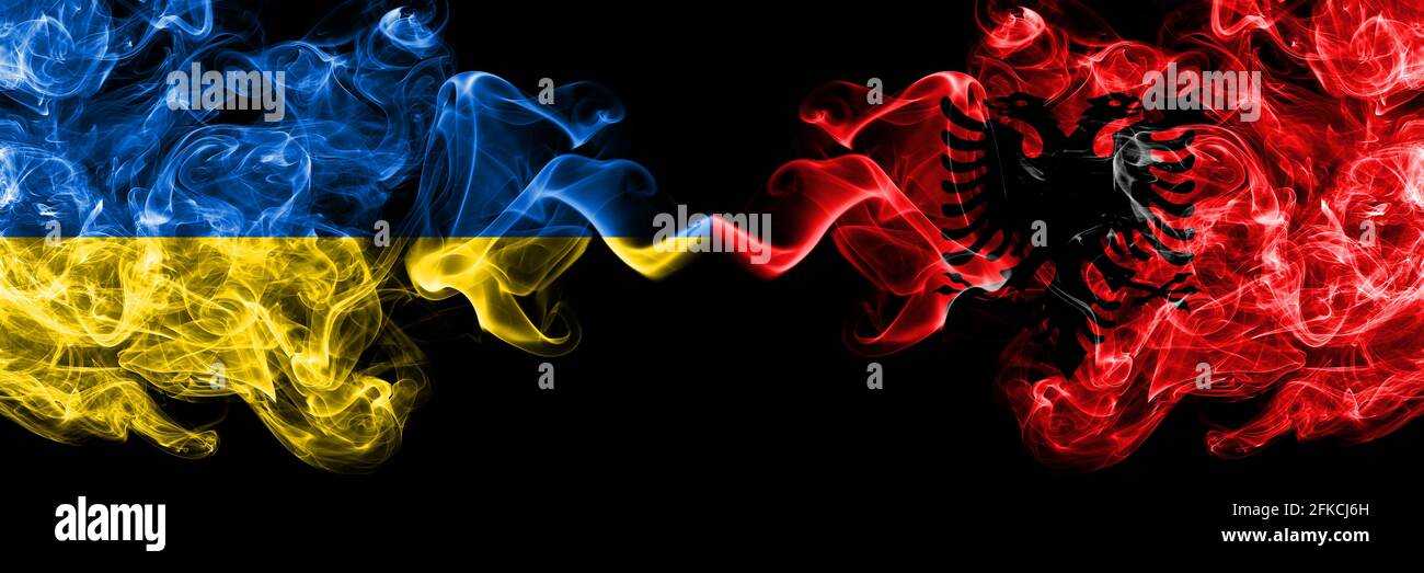 Ukraine, Ukrainian vs Albania, Albanian smoky mystic flags placed side ...