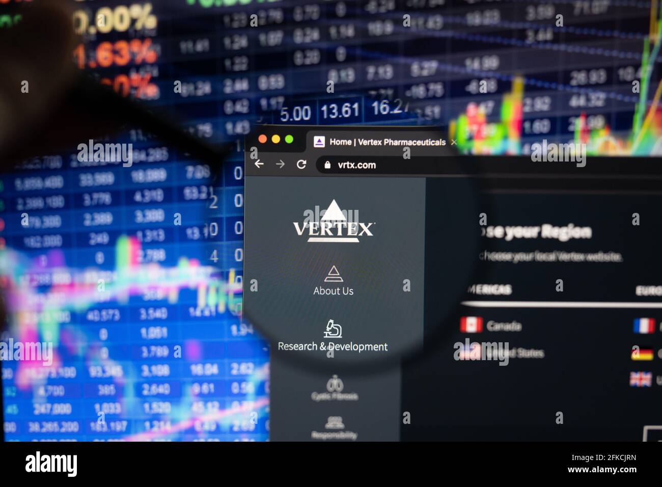 Vertex company logo on a website with blurry stock market developments in the background, seen ...