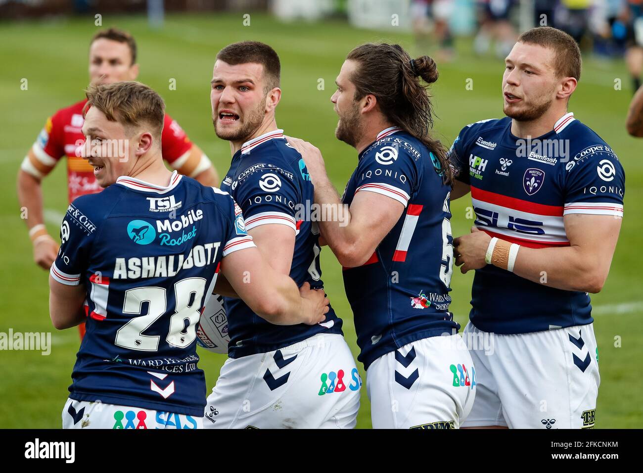 Max Jowitt (1) of Wakefield Trinity looks back to confirm his try is ...