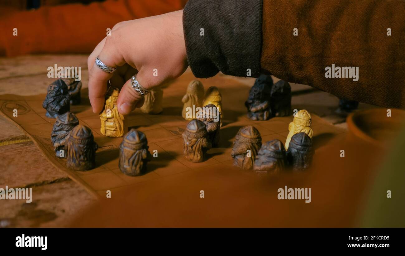 Two men playing popular strategy board game - tafl Stock Photo - Alamy