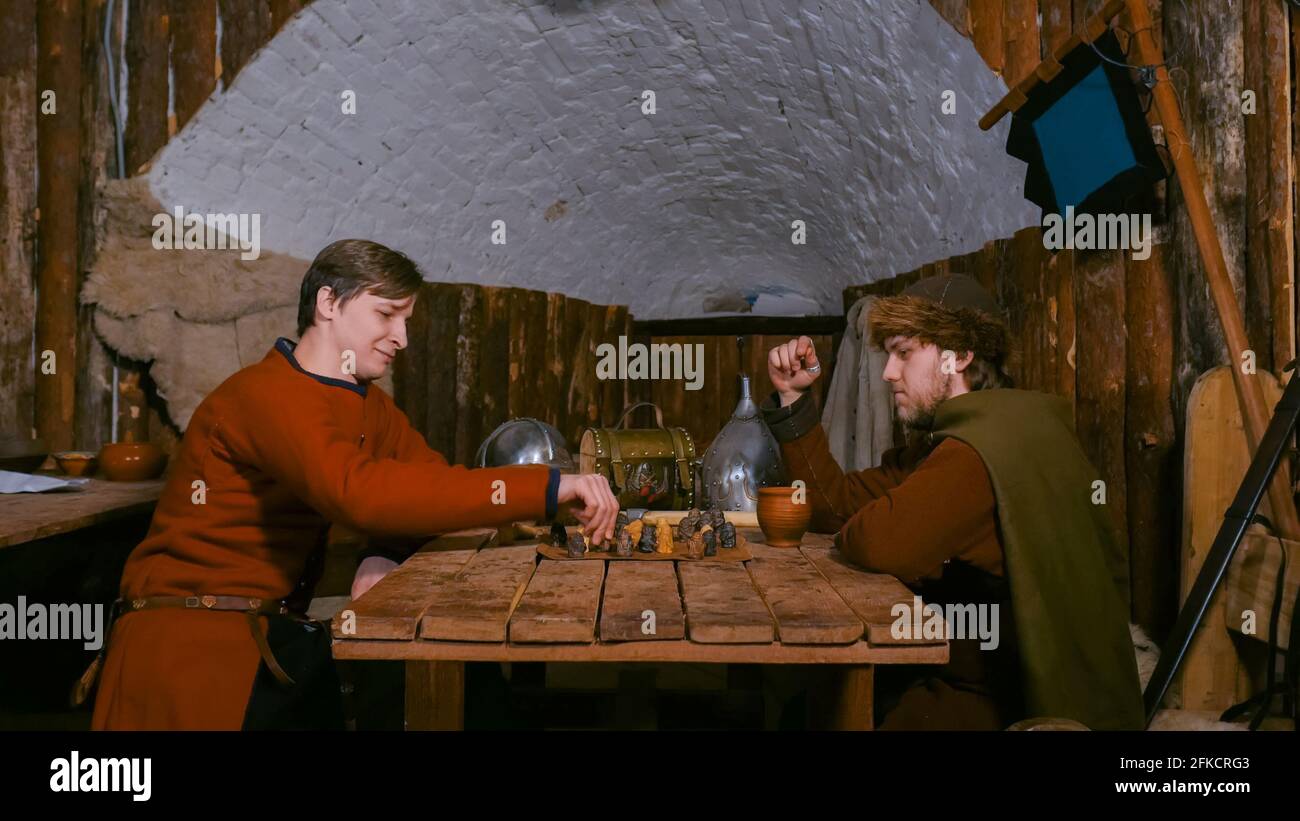 Two men playing popular strategy board game - tafl Stock Photo - Alamy