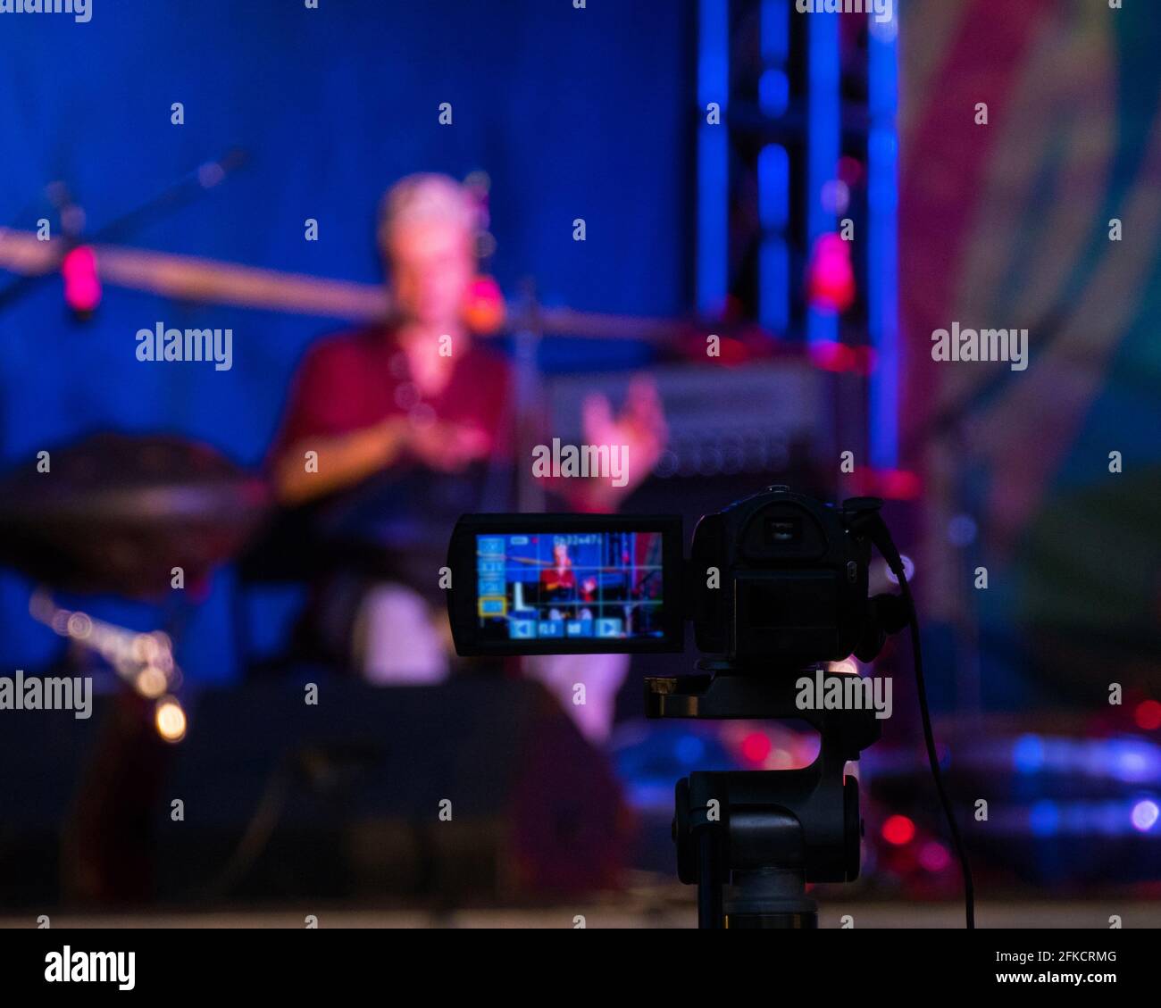 Camcorder recording open air concert Stock Photo - Alamy