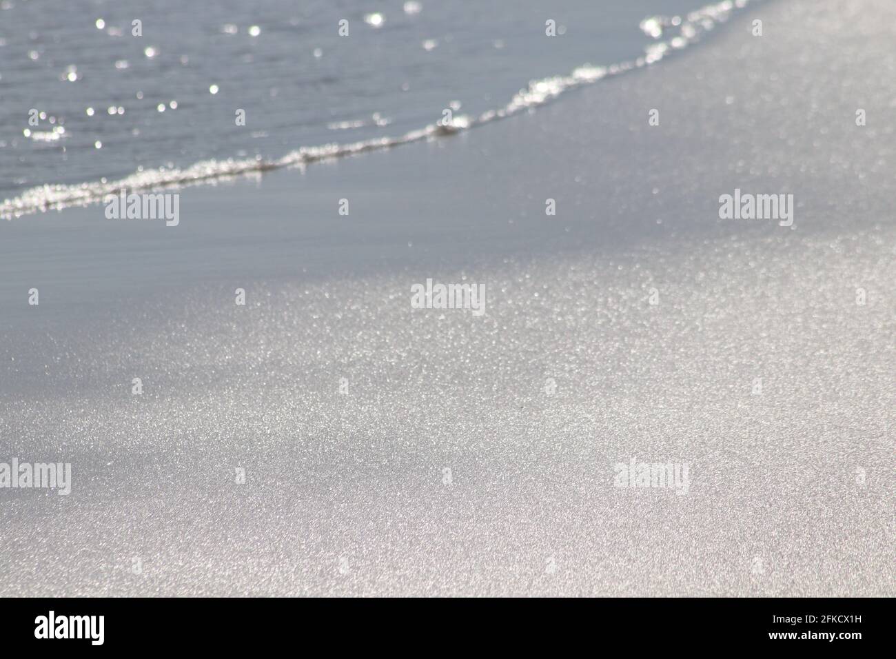Blue bubbles on beach Stock Photo - Alamy