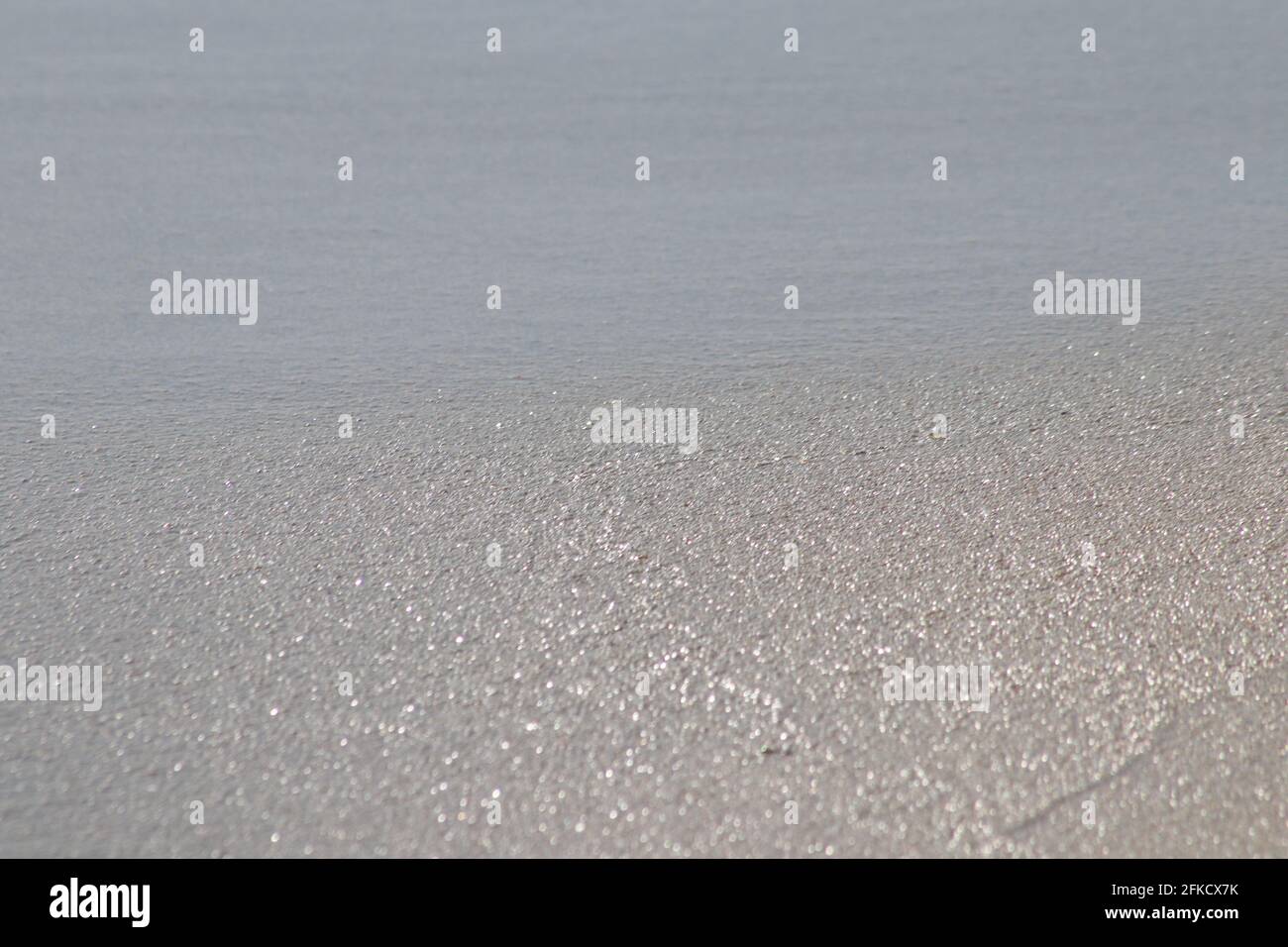Sparkling sea and sand Stock Photo - Alamy