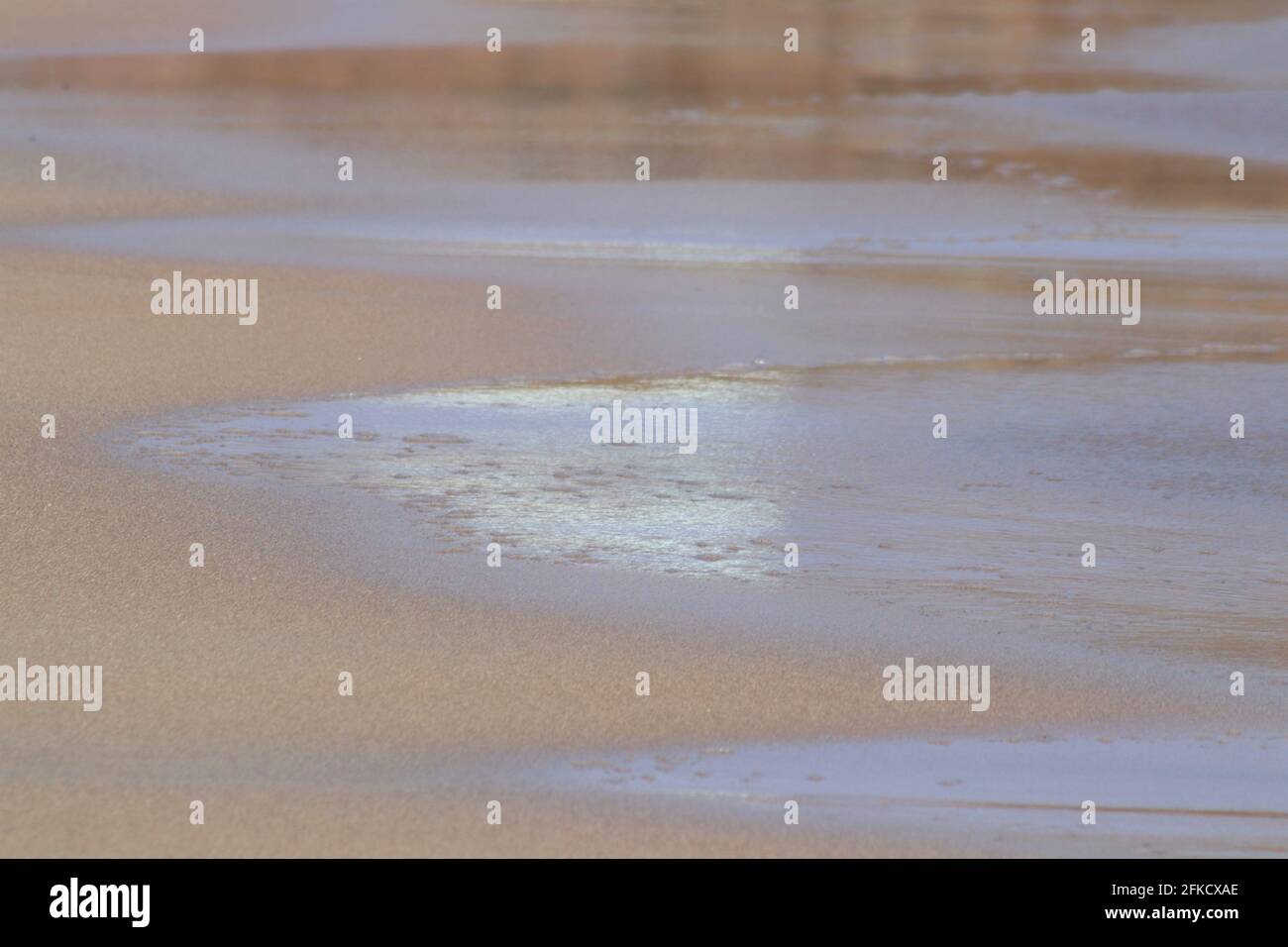 Sparkling sea and sand Stock Photo - Alamy