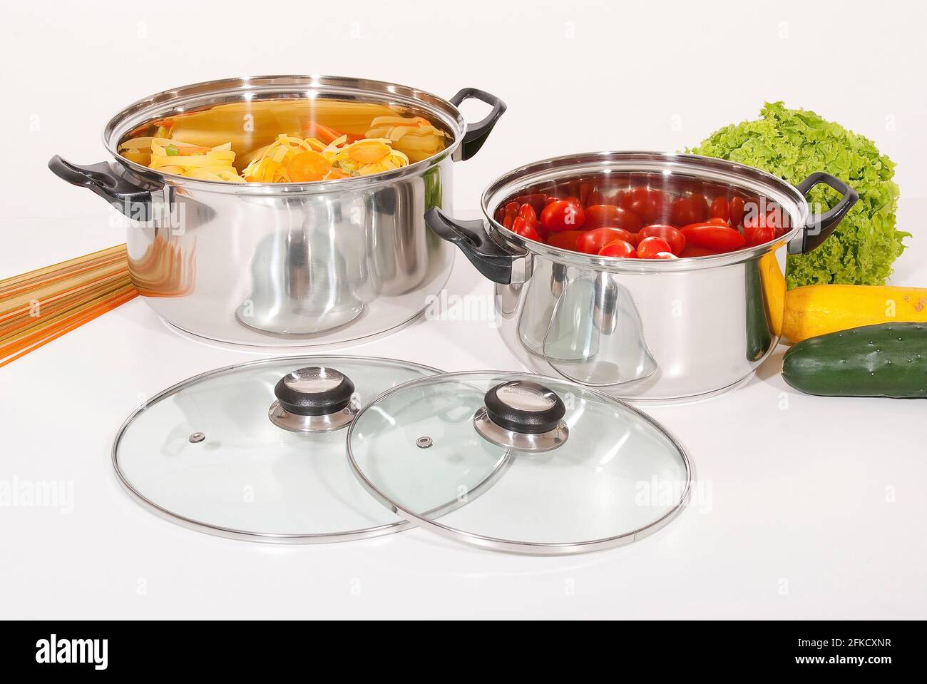 Kitchen tools; stainless steel pots set, photo on white background ...