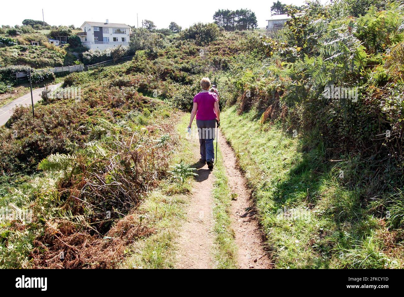 Walking on a hill pass Jersey Stock Photo - Alamy