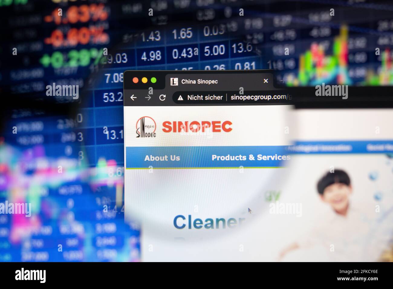 Sinopec company logo on a website with blurry stock market developments ...