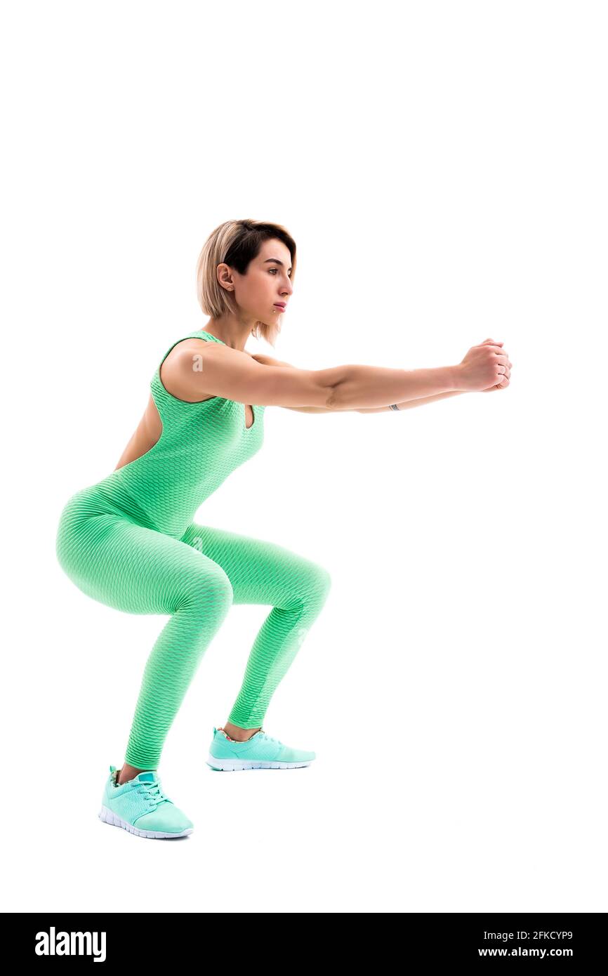 Woman squat exercise isolated Cut Out Stock Images & Pictures - Alamy
