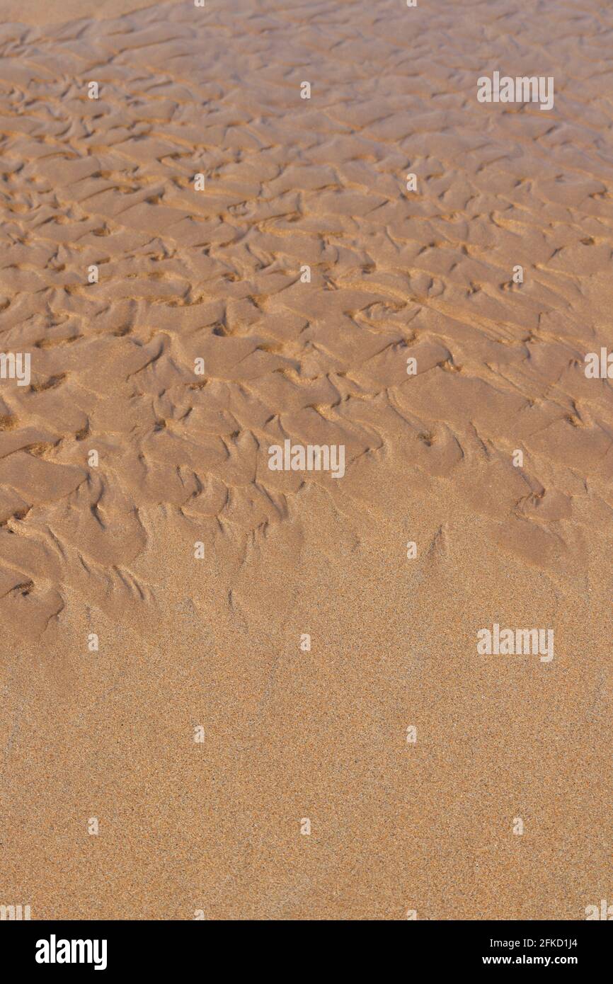 Patterns and textures in sand and seawater Stock Photo - Alamy