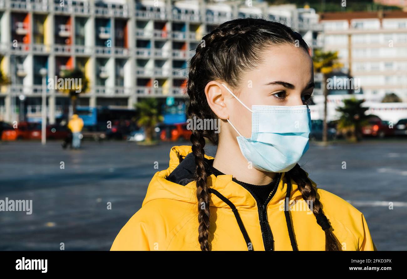 Portrait of teenage girl wearing flu mask Stock Photo - Alamy
