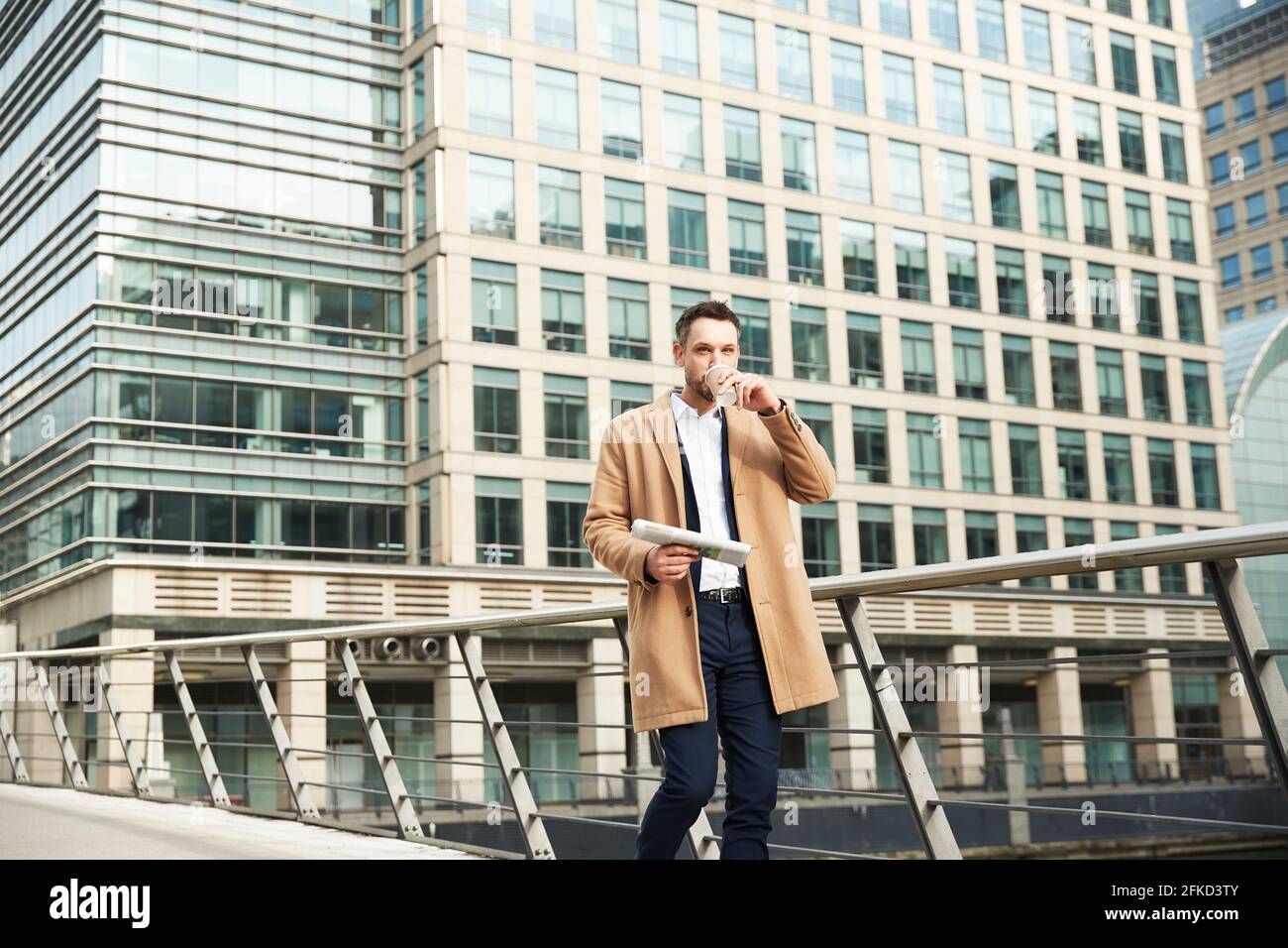 UK, London, Man walking on footbridge Stock Photo - Alamy