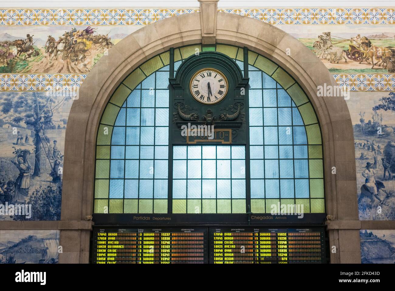 Portugal, Porto, Clock and tiles at historical Sao Bento train station ...